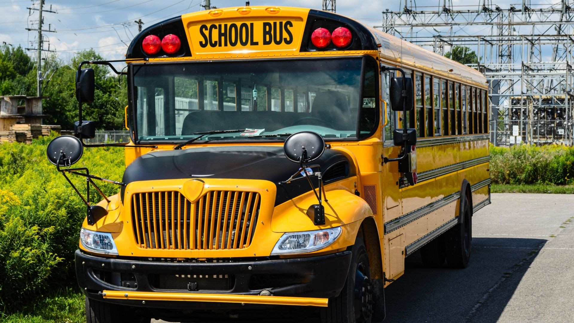 Electric school buses are cleaner and cheaper to maintain — but they have 2 problems