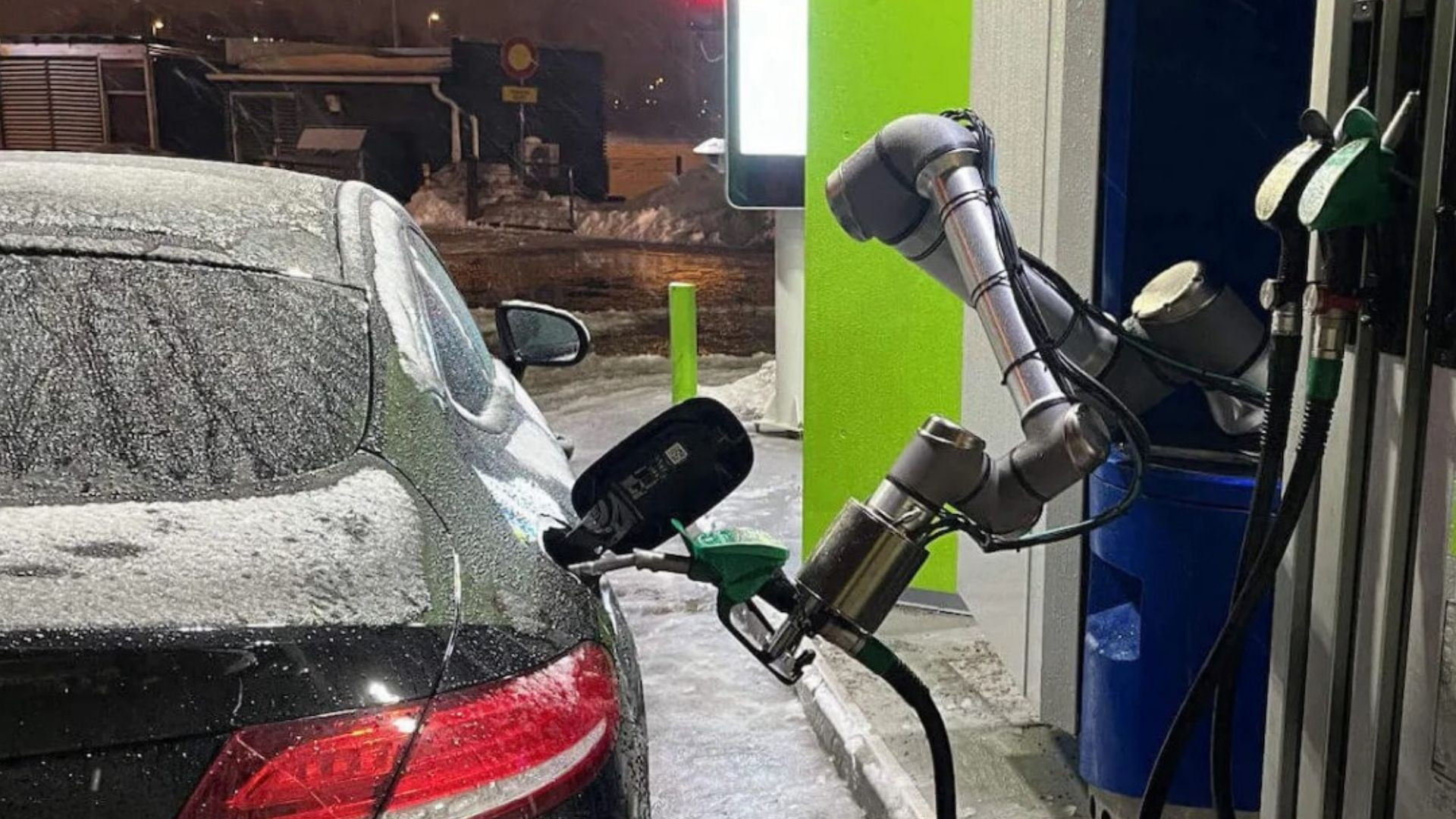 Now you can sit back and watch a robot pump gas into your cars