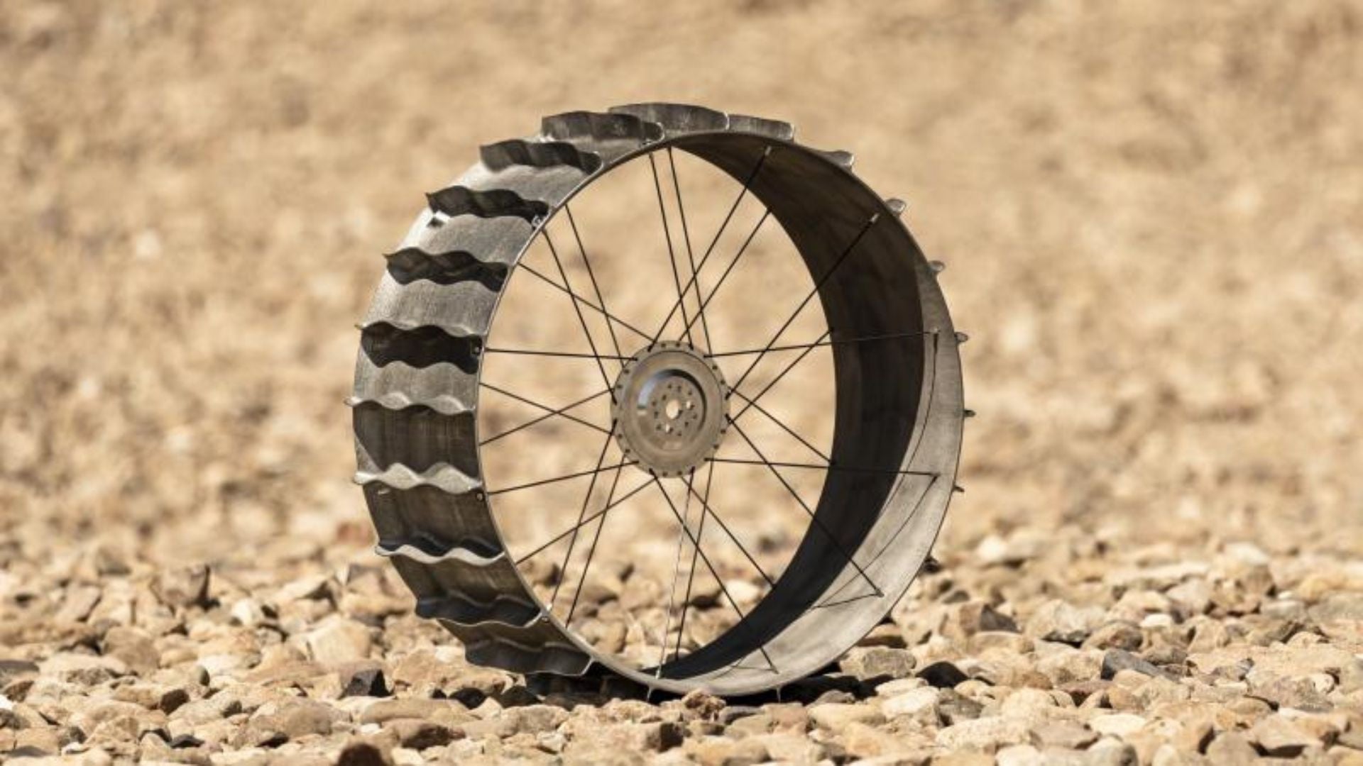 This 3D-printed Moon rover wheel uses additive manufacturing
