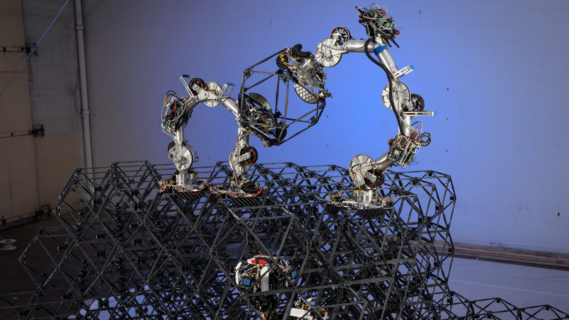 Robots build strong structures, reconfigurable like LEGO