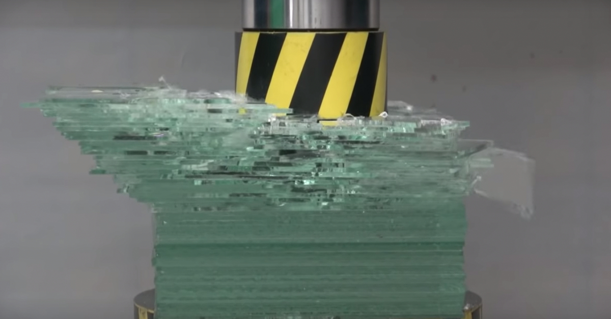 100 Ton of Pressure versus 50 Sheets of Glass