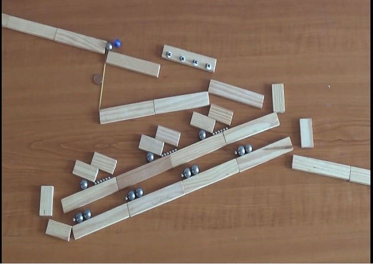 Ingenious Rube Goldberg Machine Made from Marbles and Magnets