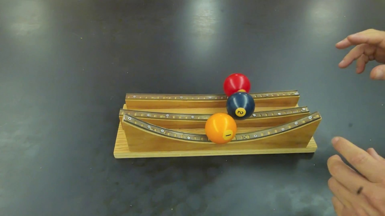 This Great Physics Teacher Demonstrates the Basics of Physics with Marbles