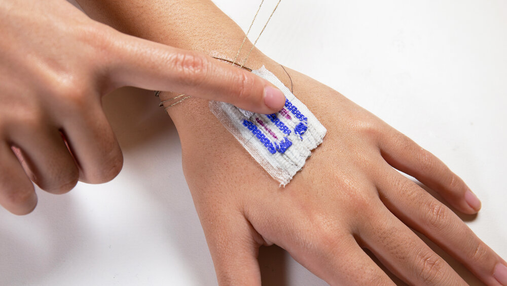 On-Skin Wearable Technology Combined With Traditional Weaving