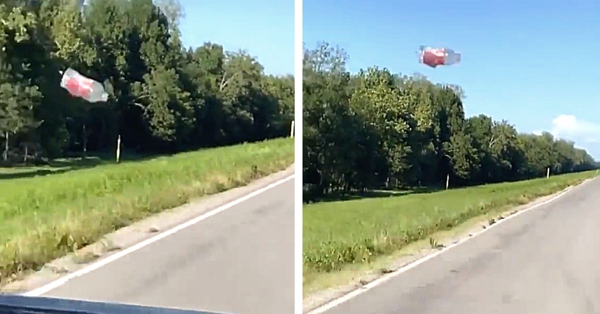 'Flying' Plastic Bottle Pulled Behind Moving Truck With Aerodynamic Drag